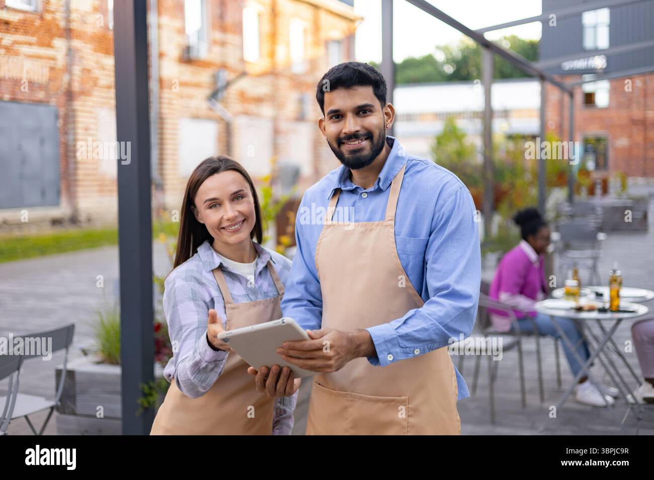 Cafe staff taking orders hi-res stock photography and images - Alamy