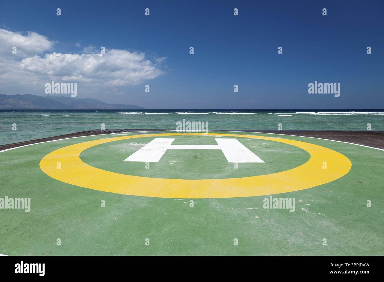 Helipad by tropic sea, helicopter landing site on ocean Stock Photo - Alamy