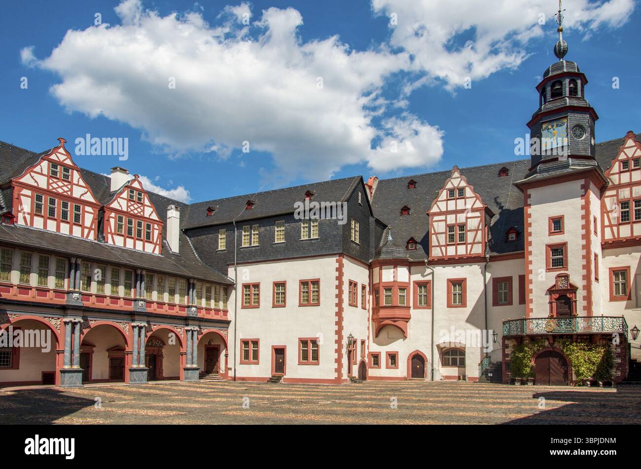 Deserted inner courtyard of Weilburg Castle with facades of the ...