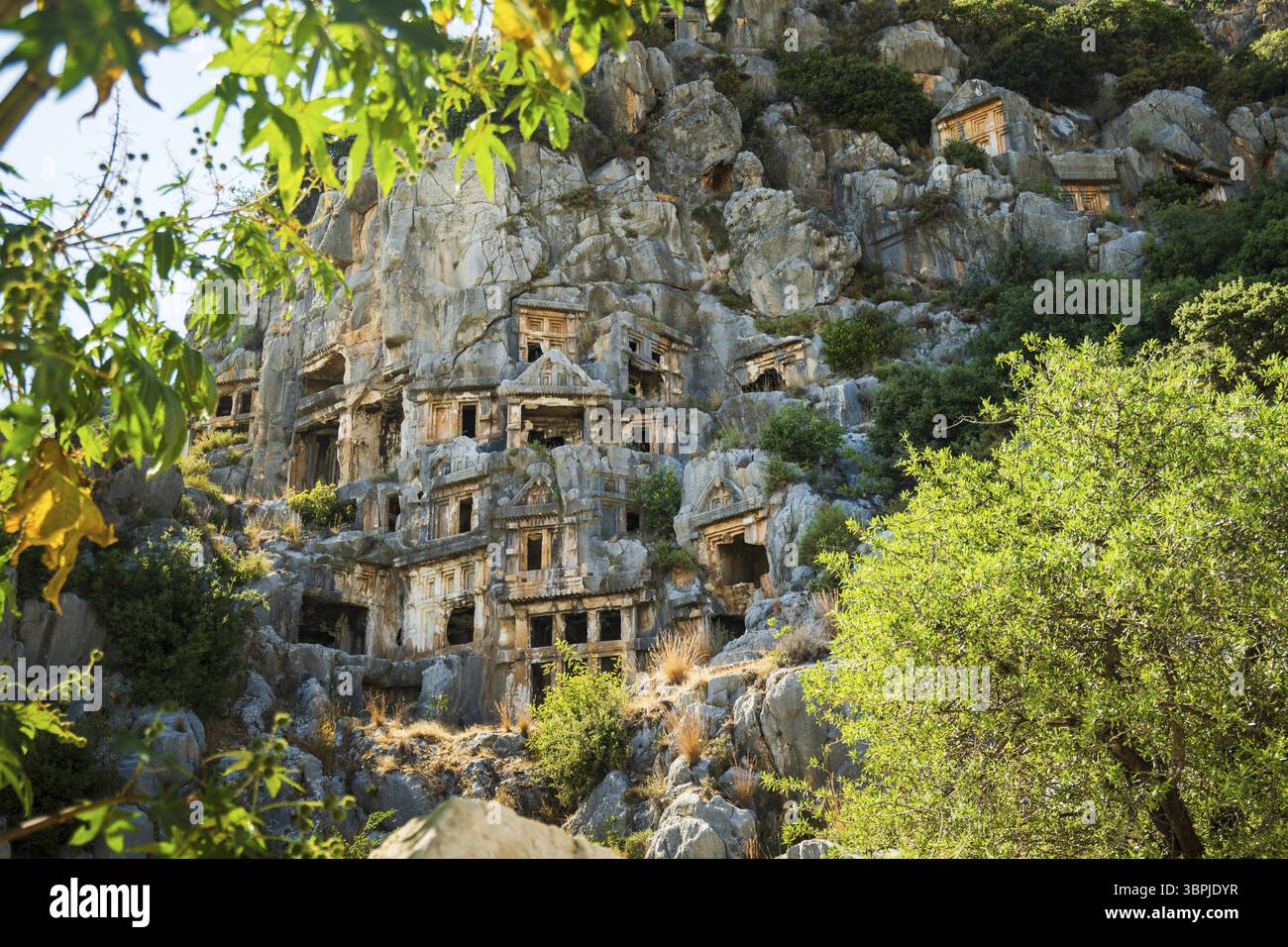 Myra archaeological site with rock tombs in Demre, Turkey. The Ancient ...