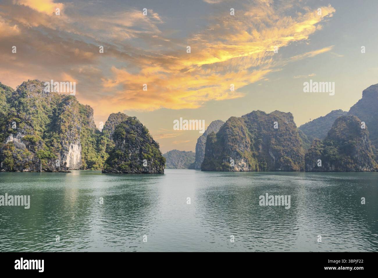 Halong Bay, Vietnam, with limestone hills and sunset sky. landscape of ...