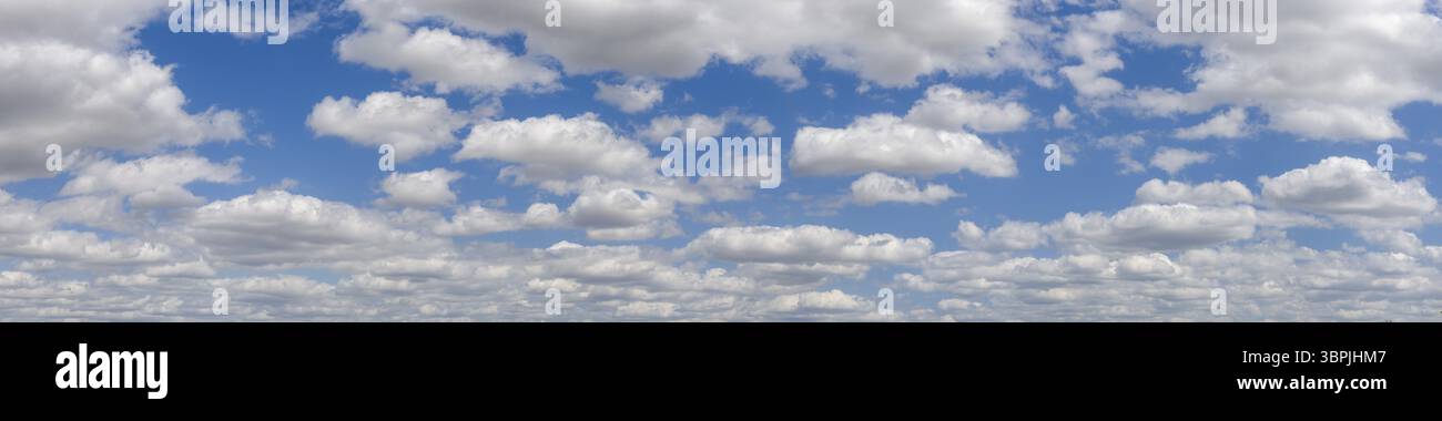 Panoramic photo of many cumulus or cluster clouds in clear air with ...