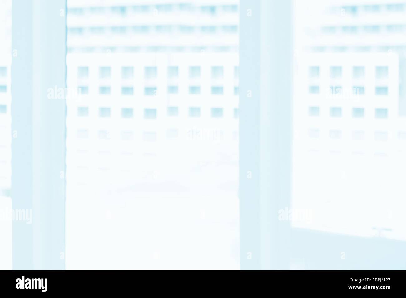 Buildings seen through glass window Stock Photo - Alamy