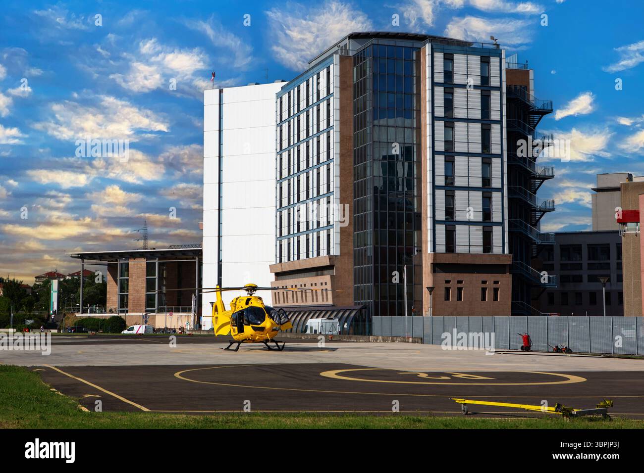 Yellow helicopter sits prepared for urgent medical missions hospital ...
