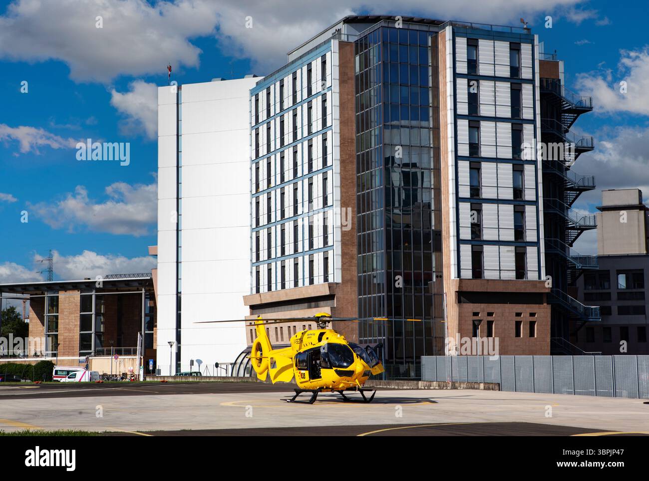Yellow helicopter sits prepared for urgent medical missions hospital ...