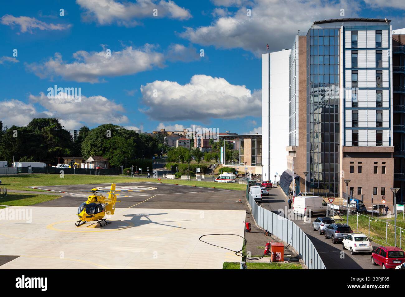 Yellow helicopter sits prepared for urgent medical missions hospital ...