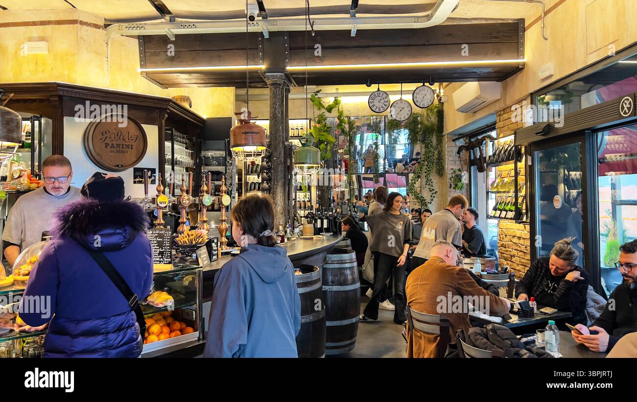 This lively Italian cafe offers a bustling atmosphere where people ...