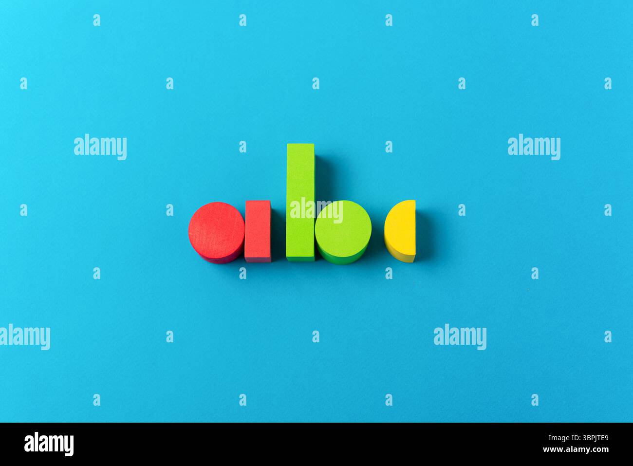 Colorful ABC letters blocks learning education concept blue background ...