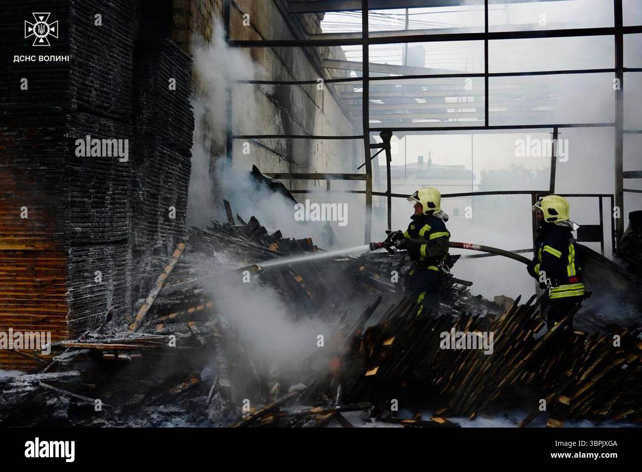 In this photo provided by the Ukrainian Emergency Service, firefighters ...
