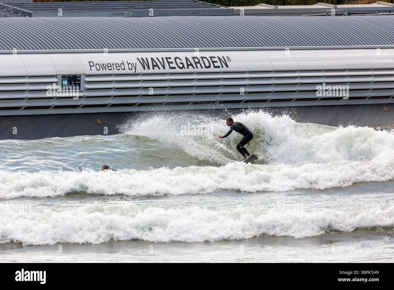 Inland surfer ride a wave at Lost Shore Surf Resort, Europe’s Largest ...