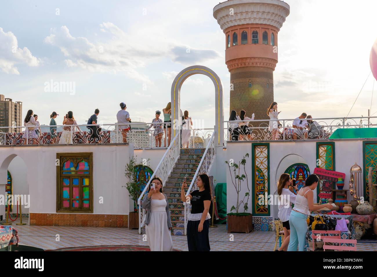 Tourists visit the Grand Bazaar in Urumqi City, northwest China's ...
