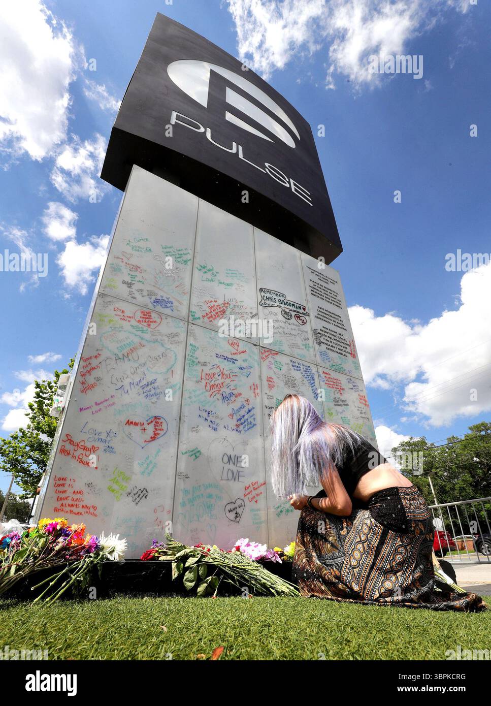 June 12, 2020, Orlando, FL, USA: A visitor lays flowers at the Pulse ...
