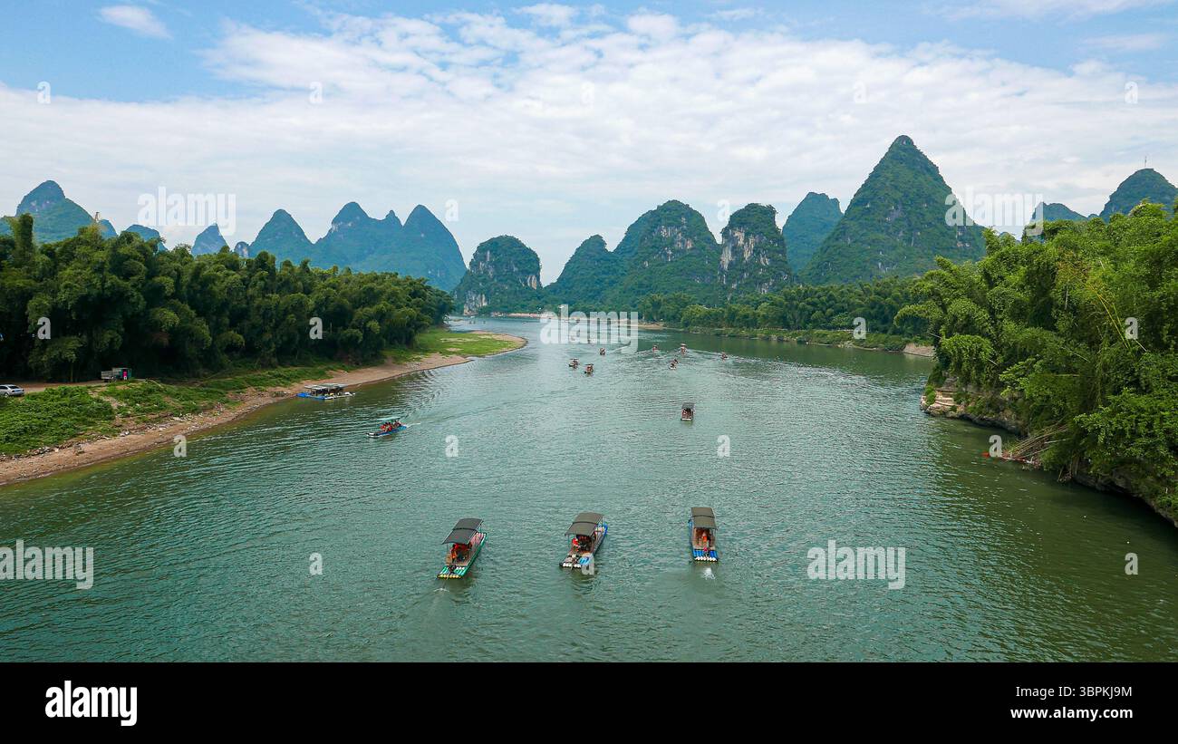 Aerial view of bamboo rafts and karst peaks along the scenic Li River ...