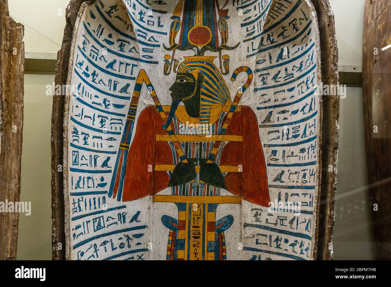 Ancient Egyptian sarcophagus with a depiction of the god Osiris ...