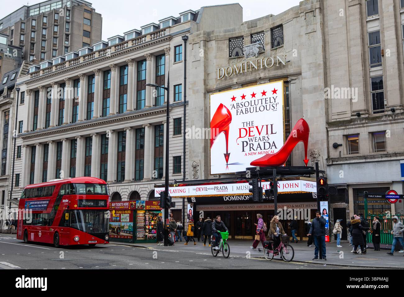 London, UK - February 3rd 2025: An electronic billboard and large red ...