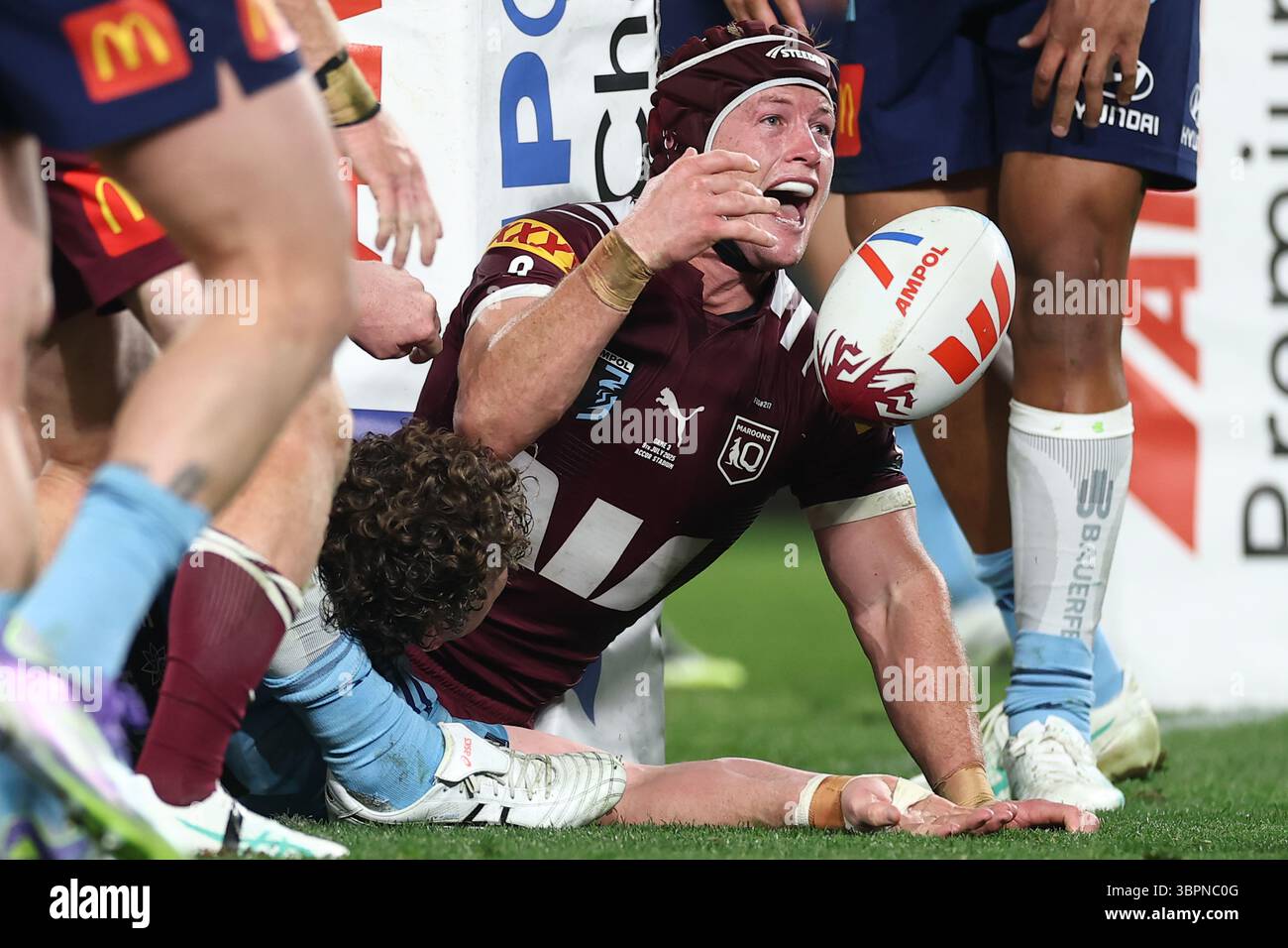 Harry Grant of the Maroons scores a try during the State of Origin game ...