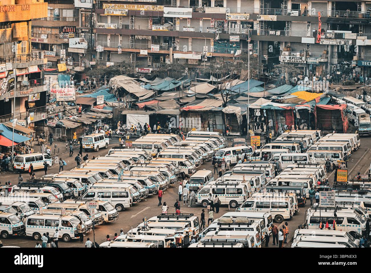 Aerial view of a crowded minibus taxi park in Kampala, Uganda Stock ...