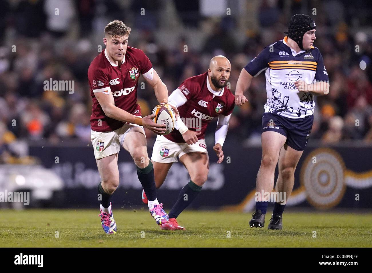 The British & Irish Lions' Garry Ringrose (left) carries the ball ...
