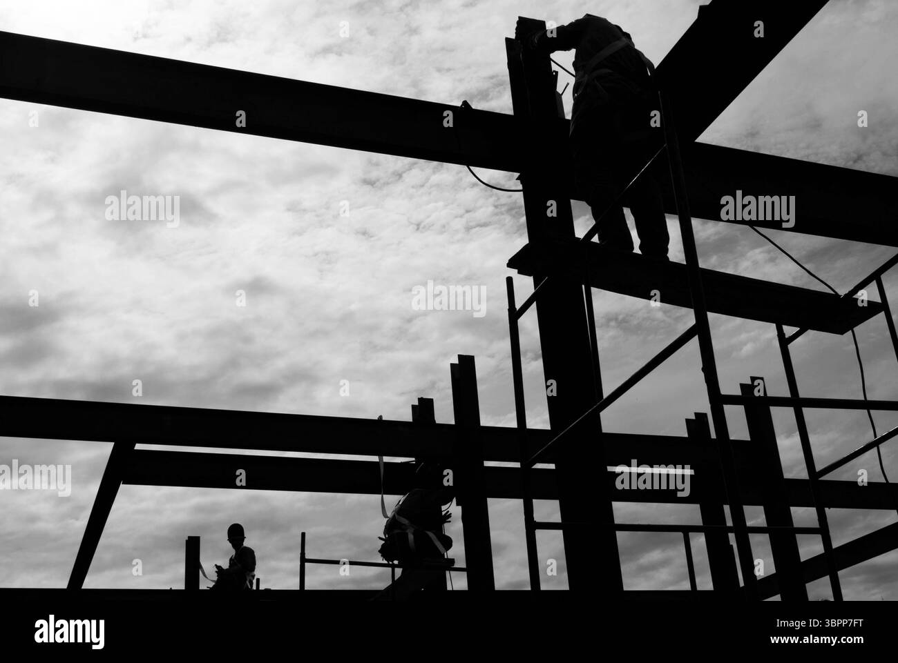construction worker performing services on the structure Stock Photo ...