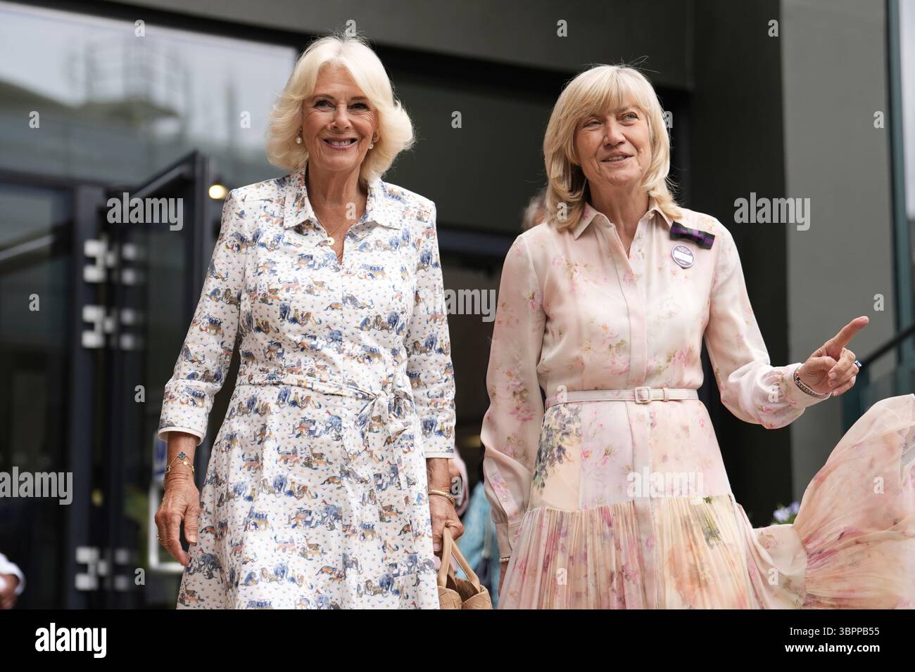Britain's Queen Camilla, left arrives with Chair Deborah Jevans at the ...