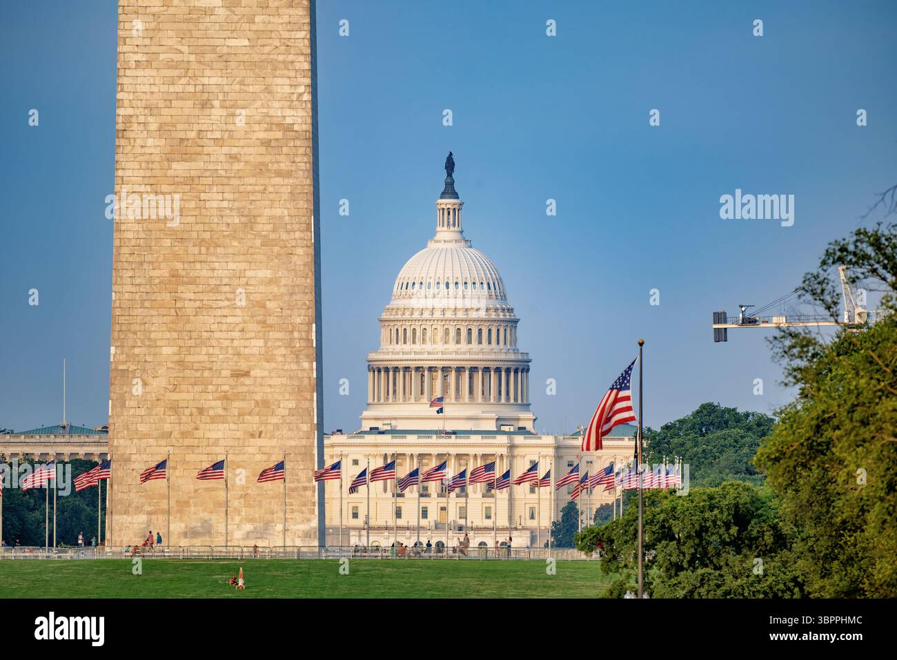 WASHINGTON DC — Flags are displayed at the base of the Washington ...