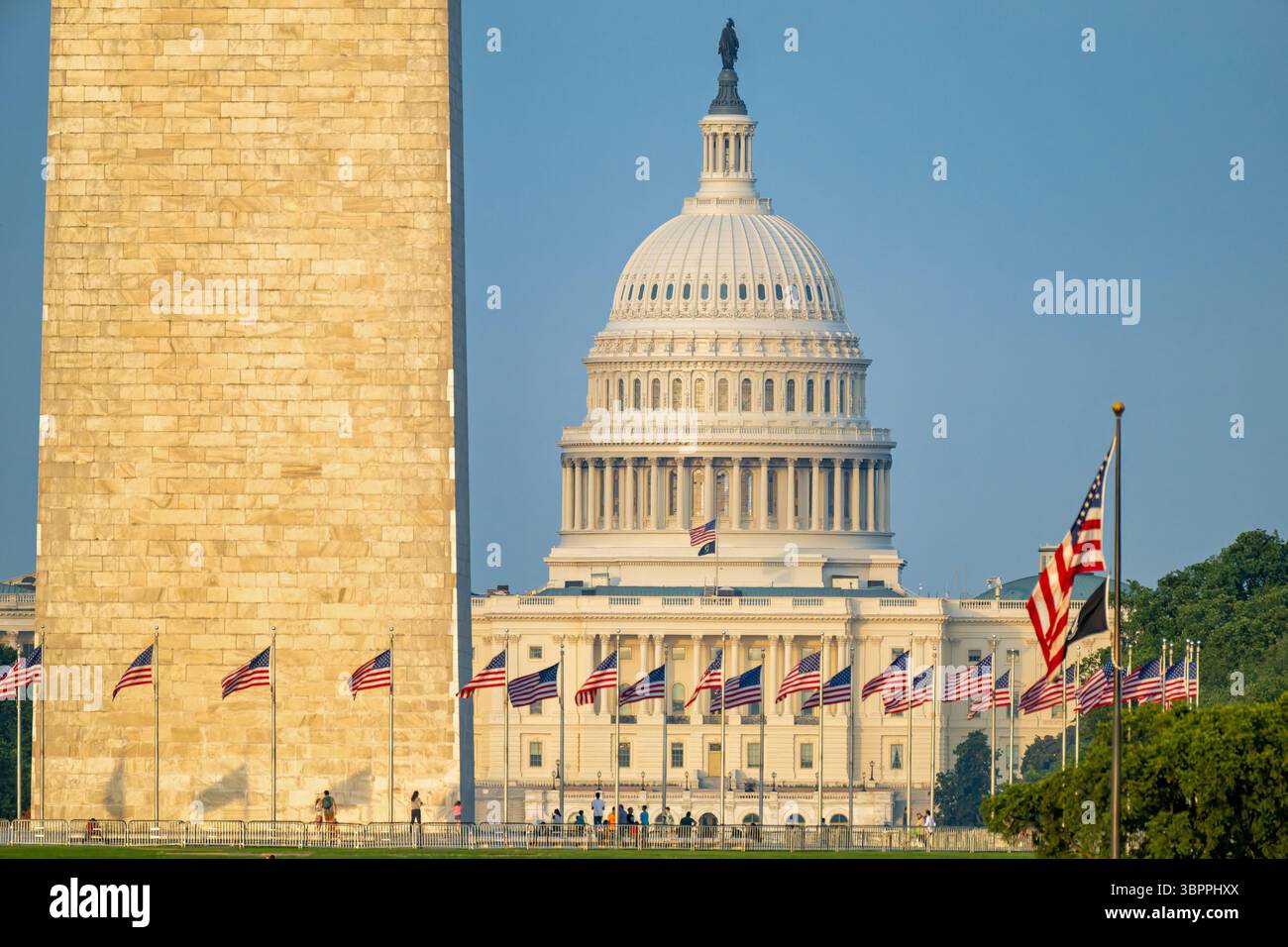 WASHINGTON DC — Flags are displayed at the base of the Washington ...