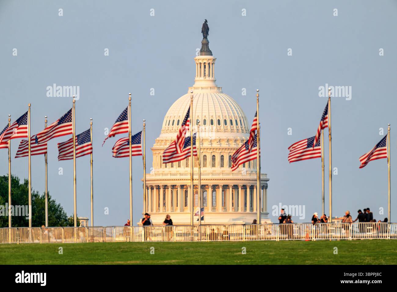 WASHINGTON DC — Flags are displayed at the base of the Washington ...