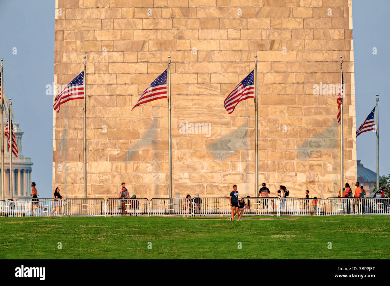 WASHINGTON DC — Flags are displayed at the base of the Washington ...
