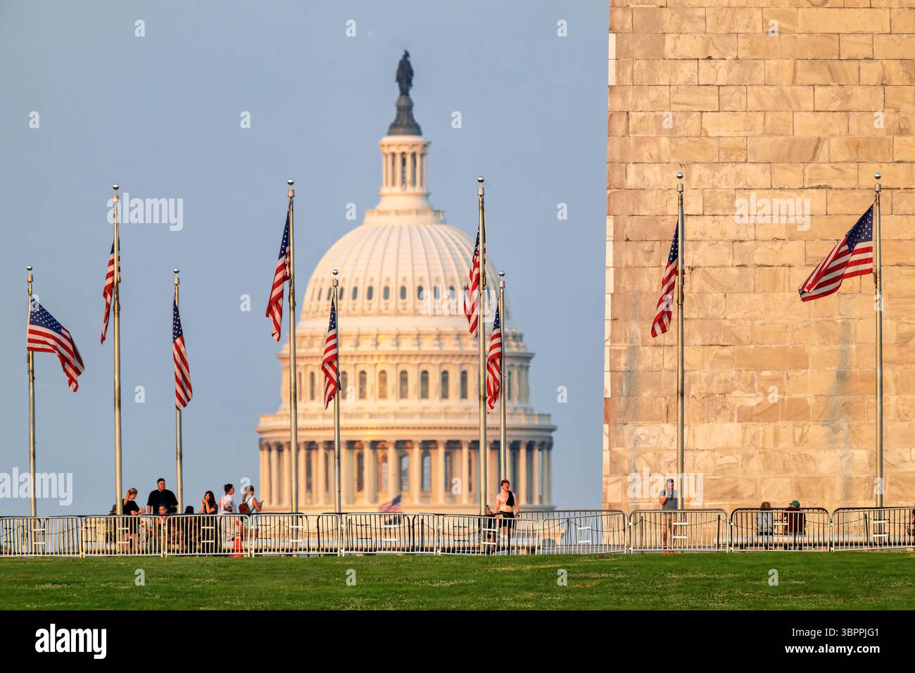 WASHINGTON DC — Flags are displayed at the base of the Washington ...