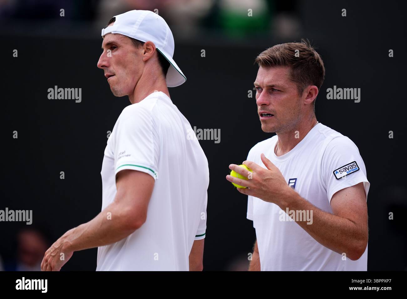 Joe Salisbury and Neal Skupski (right) during their Gentlemen's Doubles ...
