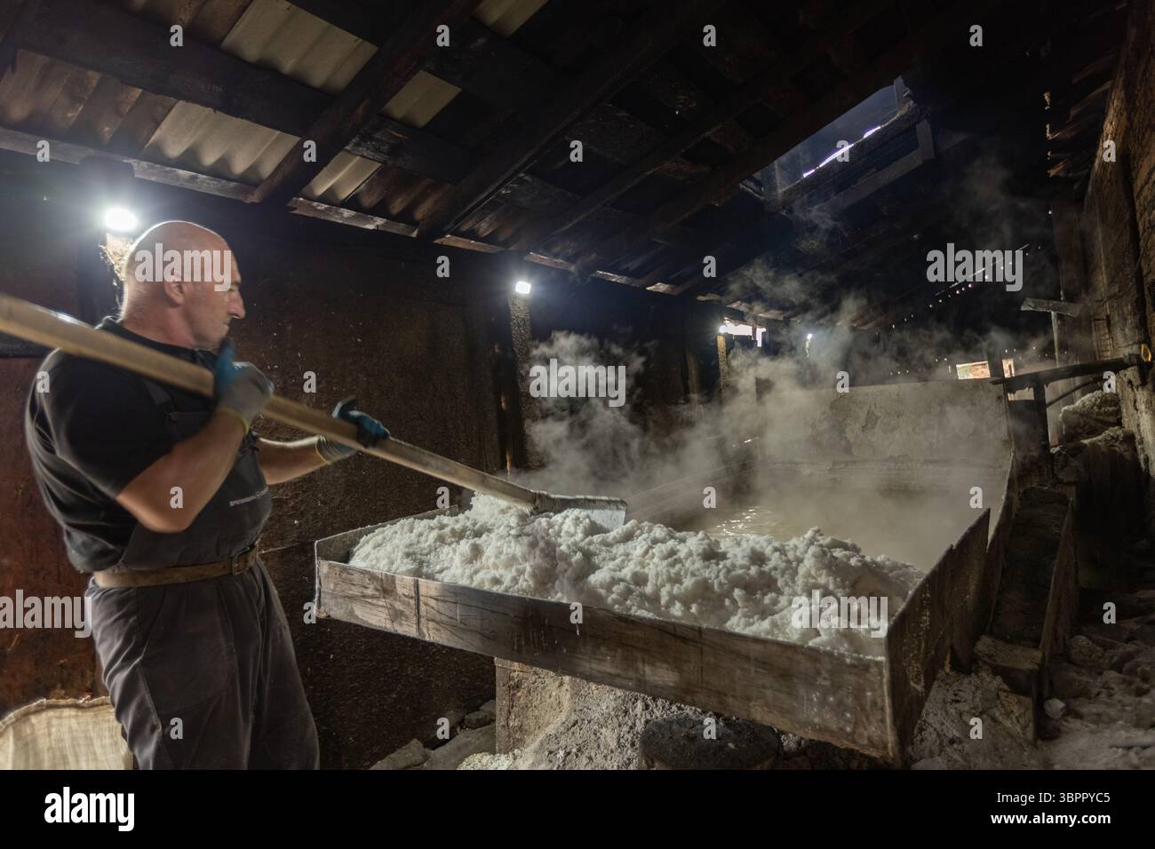 Worker at the old salt plant processing salted liquid in Drogobytch ...