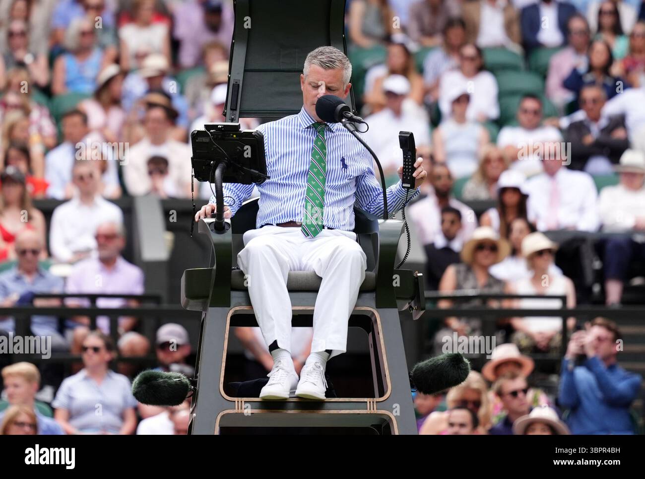 Timo Janzen, umpire, on centre court for the Ladies' Singles match ...