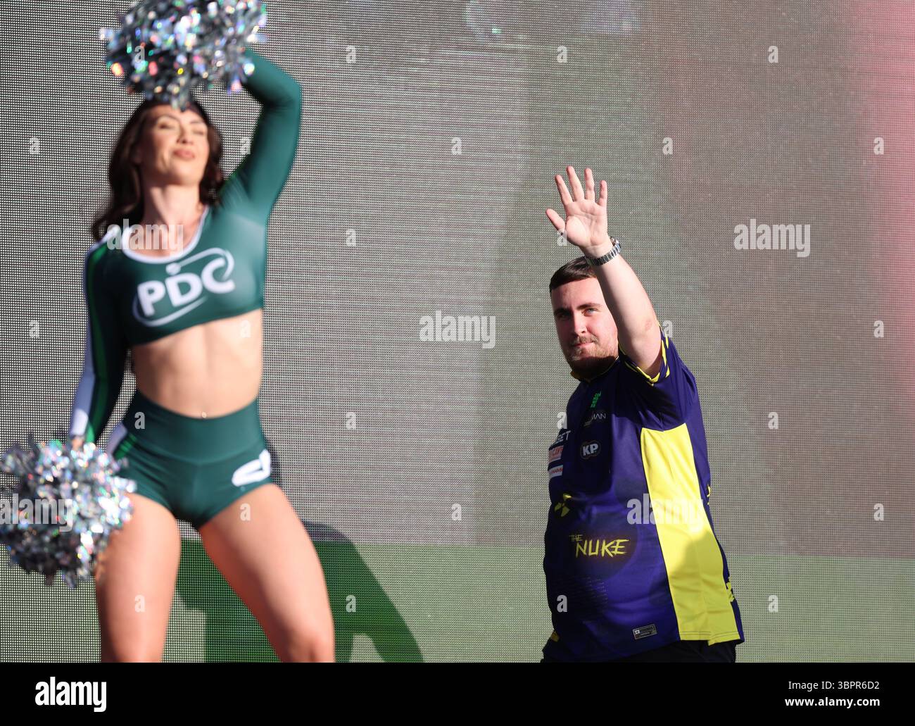 Luke Littler makes his entrance during the The Hyde Park Darts ...