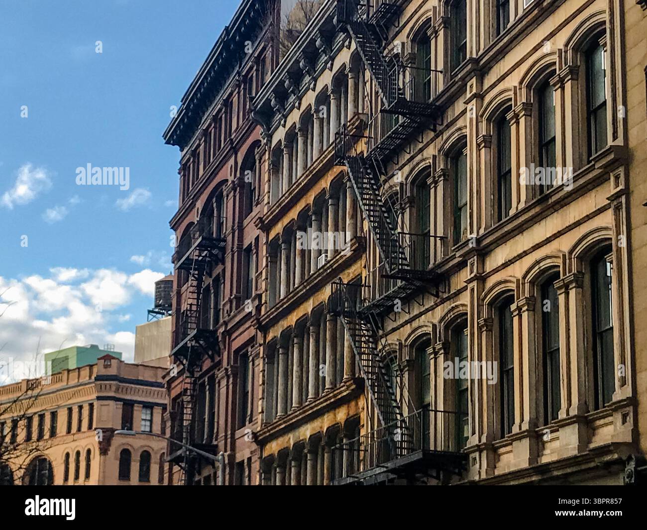 Exterior facades of rustic apartment buildings in New York City Stock ...