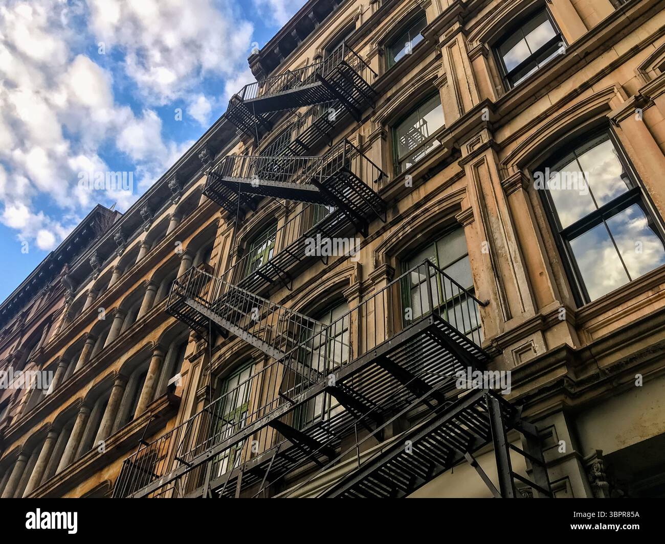 Exterior facades of rustic apartment buildings in New York City Stock ...