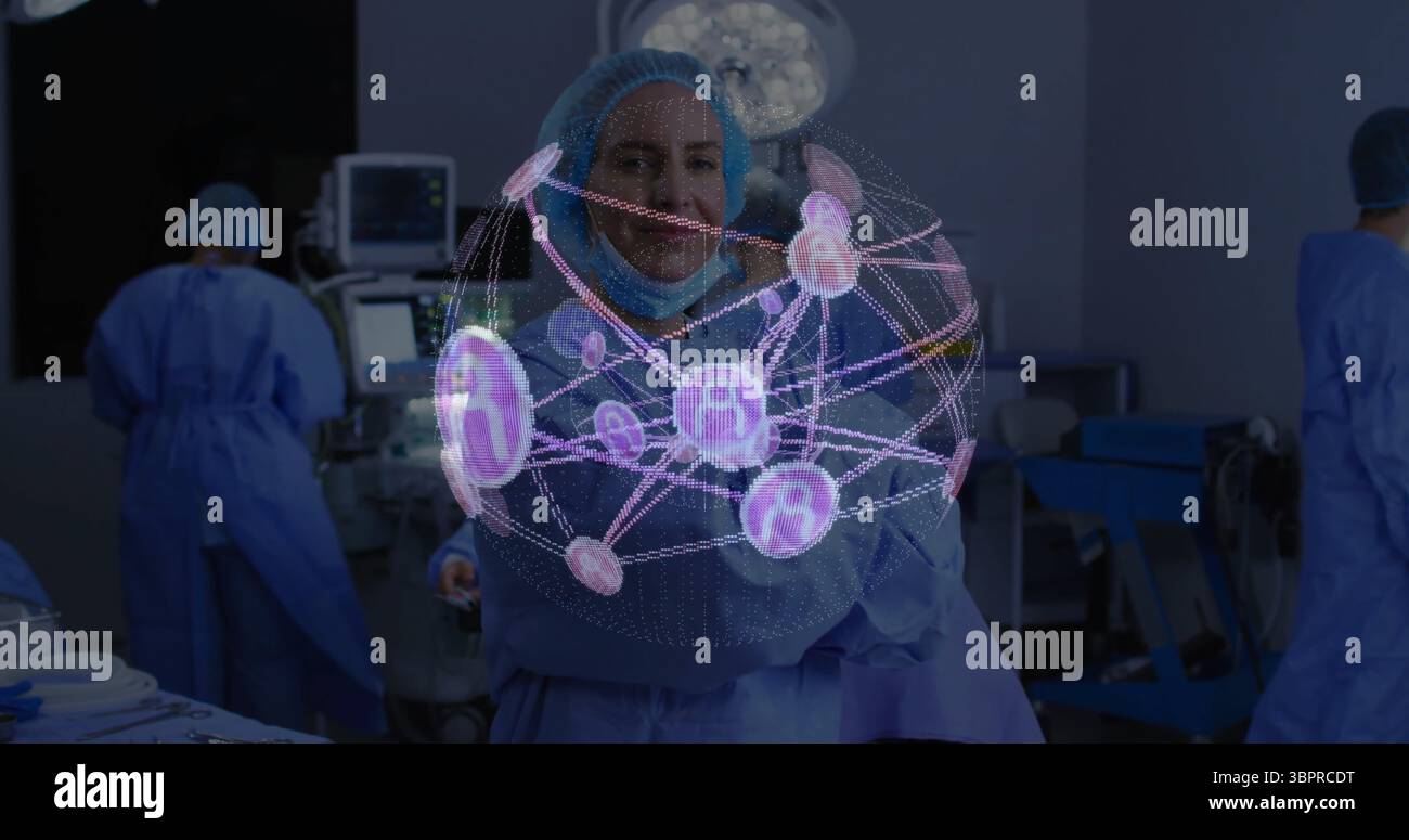 In operating room, medical professional observing image of digital ...
