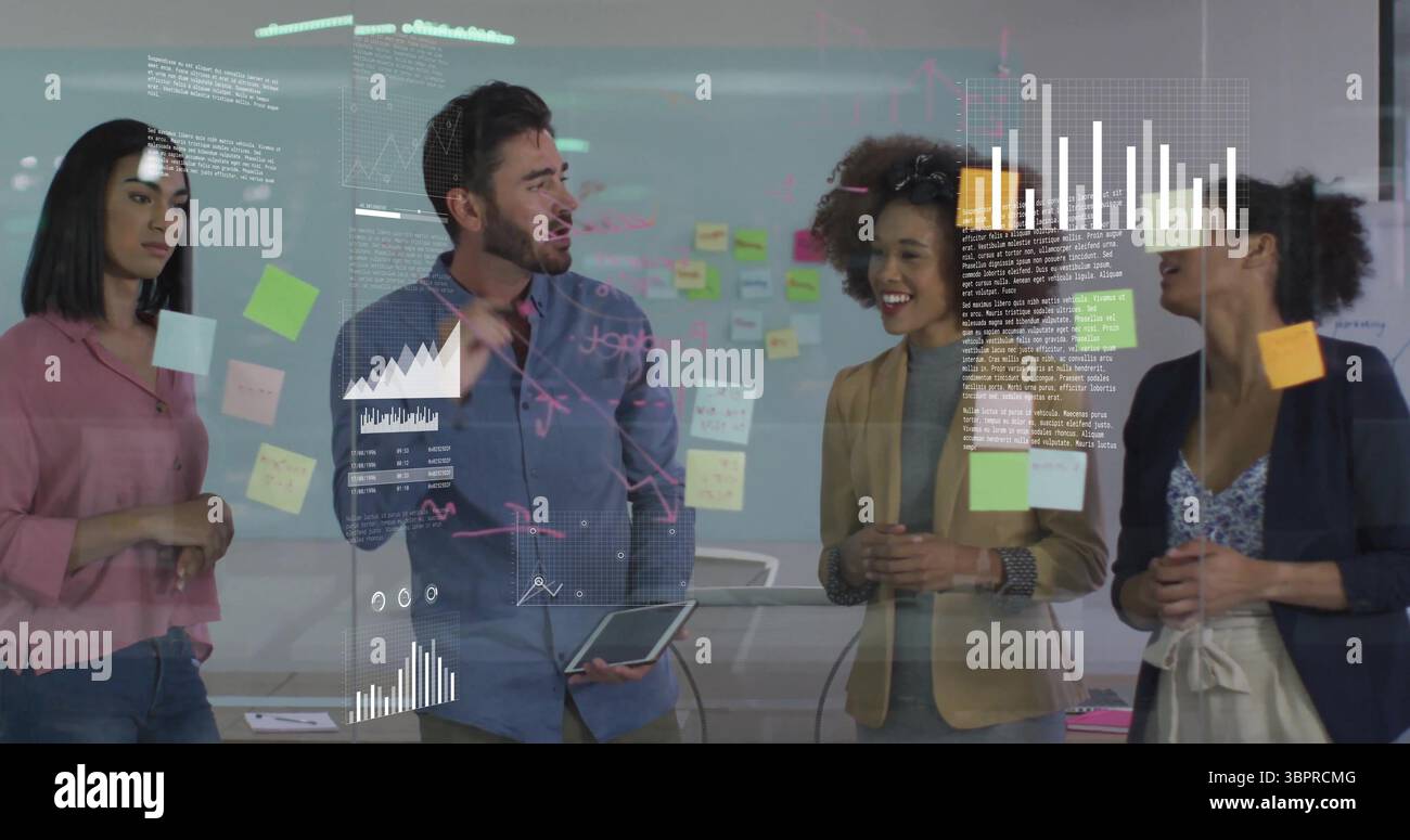 Four colleagues in business attire collaborating at office glass board ...