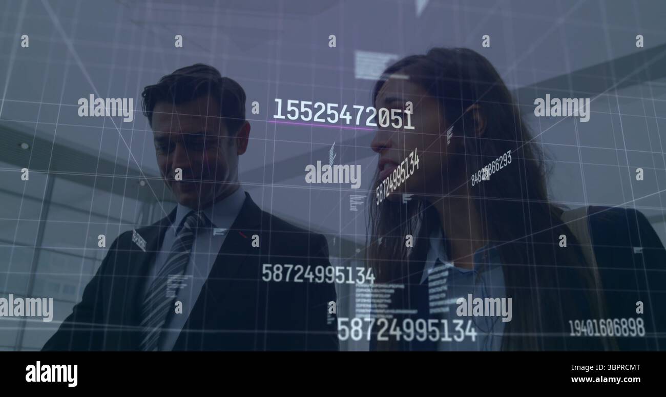 Discussing data, business professionals with digital numbers overlaying scene Stock Photo - Alamy