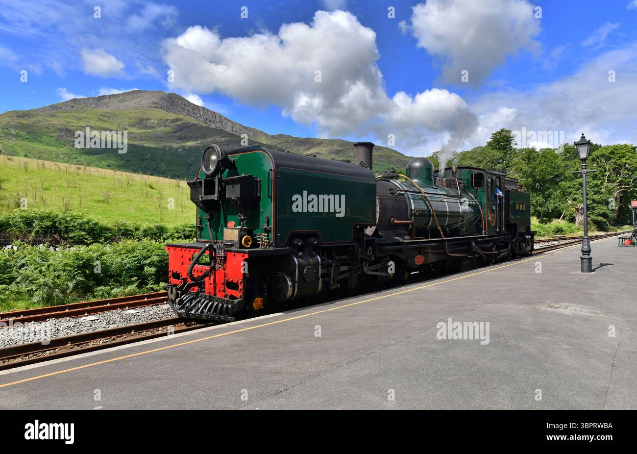 Steam locomotive at Beddgelert railway station on the narrow gauge Welsh Highland Railway in ...