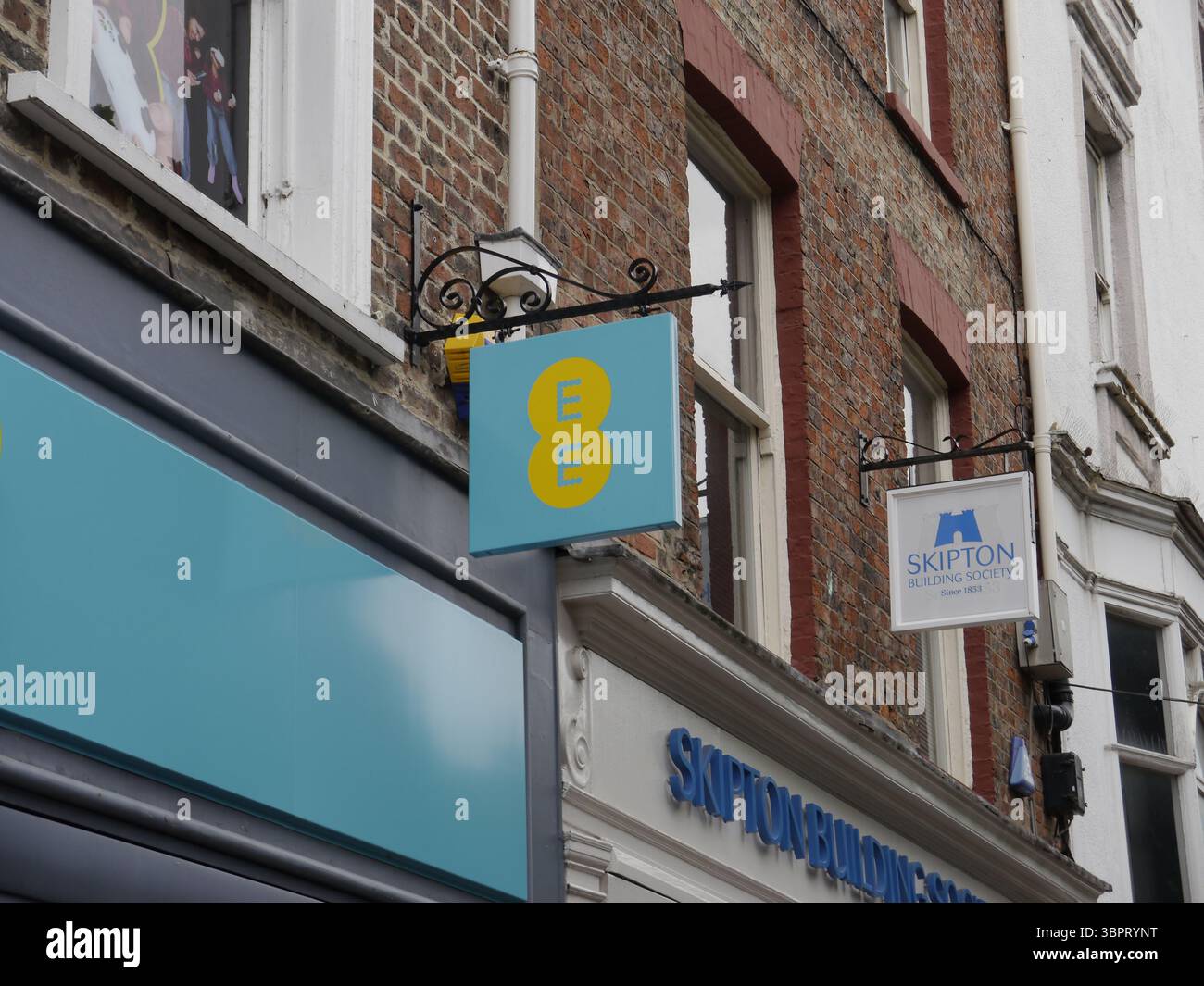 EE mobile phone network cell Corporate logo signs in York City centre ...