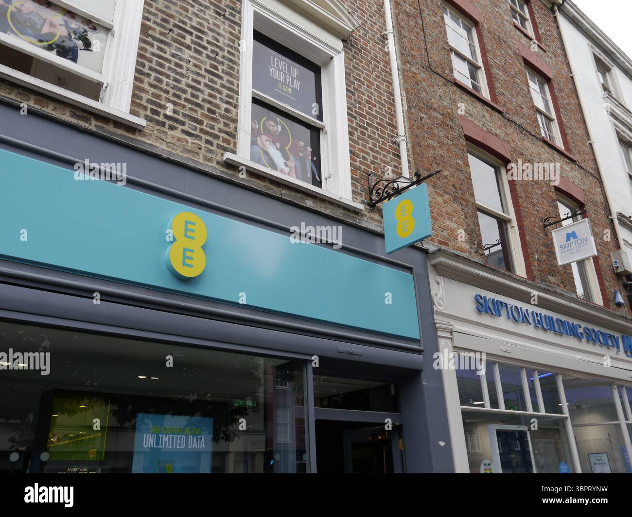 EE mobile phone network cell Corporate logo signs in York City centre ...