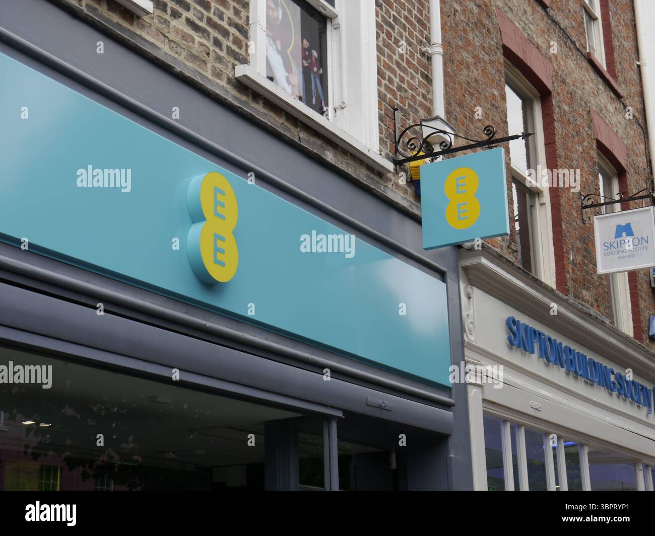 EE mobile phone network cell Corporate logo signs in York City centre ...