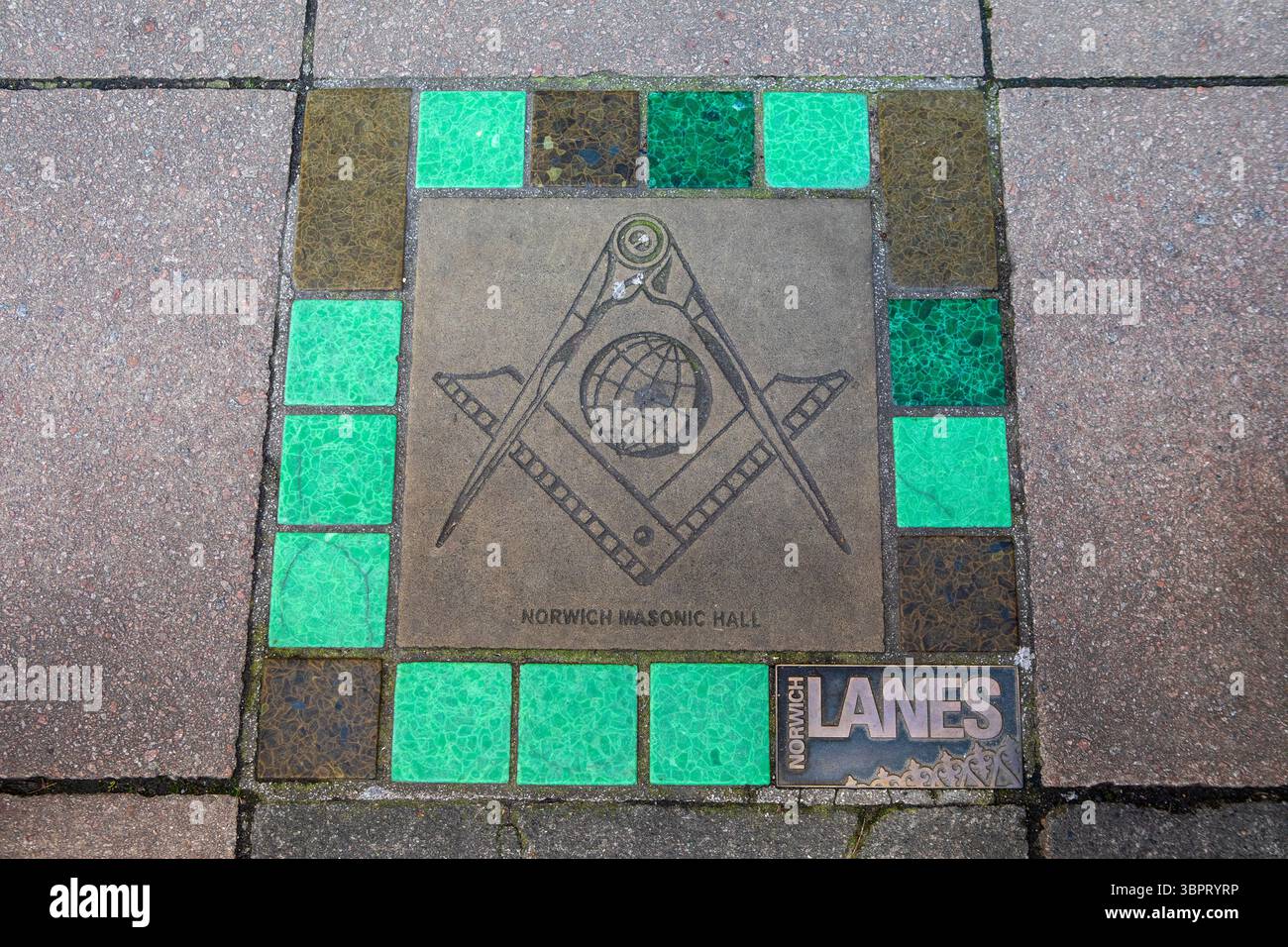 Norwich, UK - March 1st 2025: Close-up of a plaque on the pavement on ...