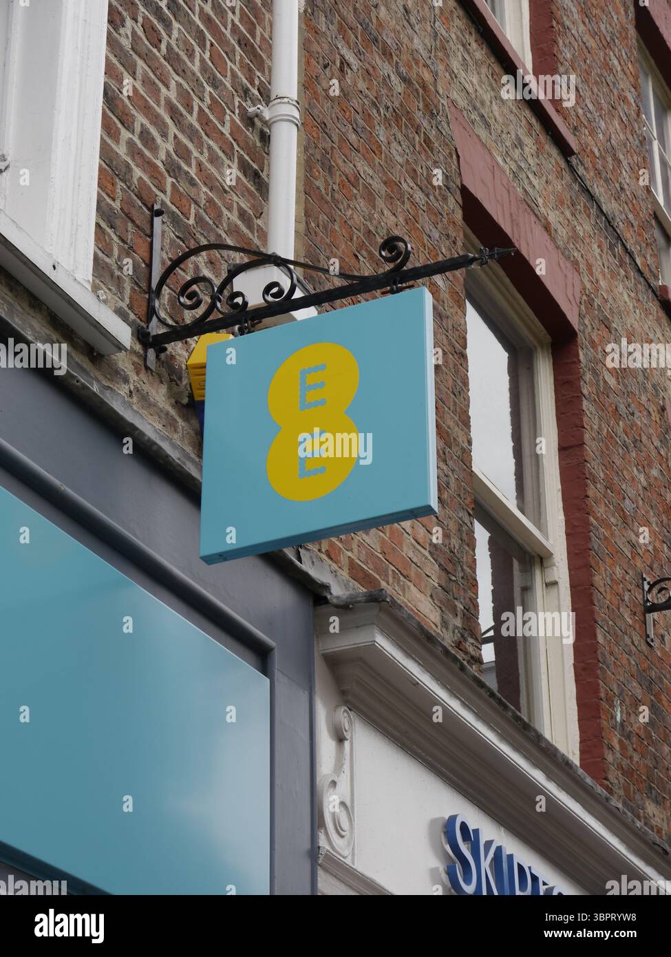 EE mobile phone network cell Corporate logo signs in York City centre ...