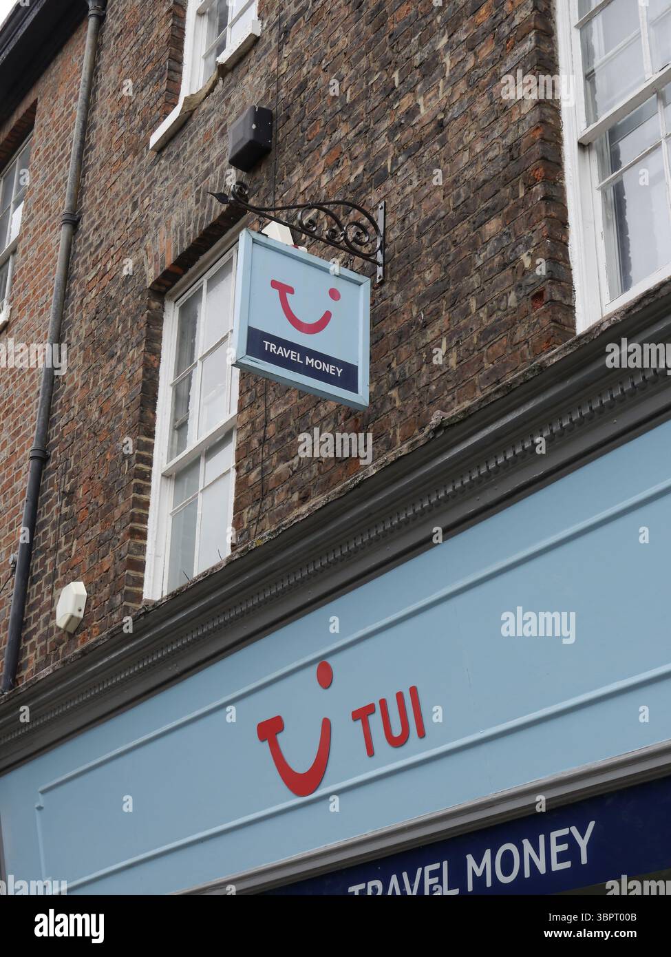 Tui travel agency formally Thompson’s travel Corporate logo signs in ...