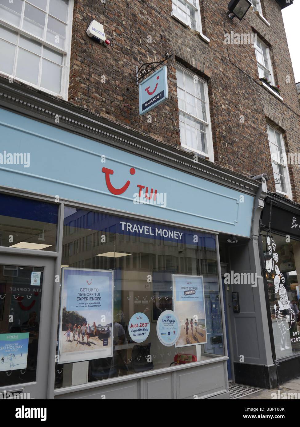 Tui travel agency formally Thompson’s travel Corporate logo signs in ...