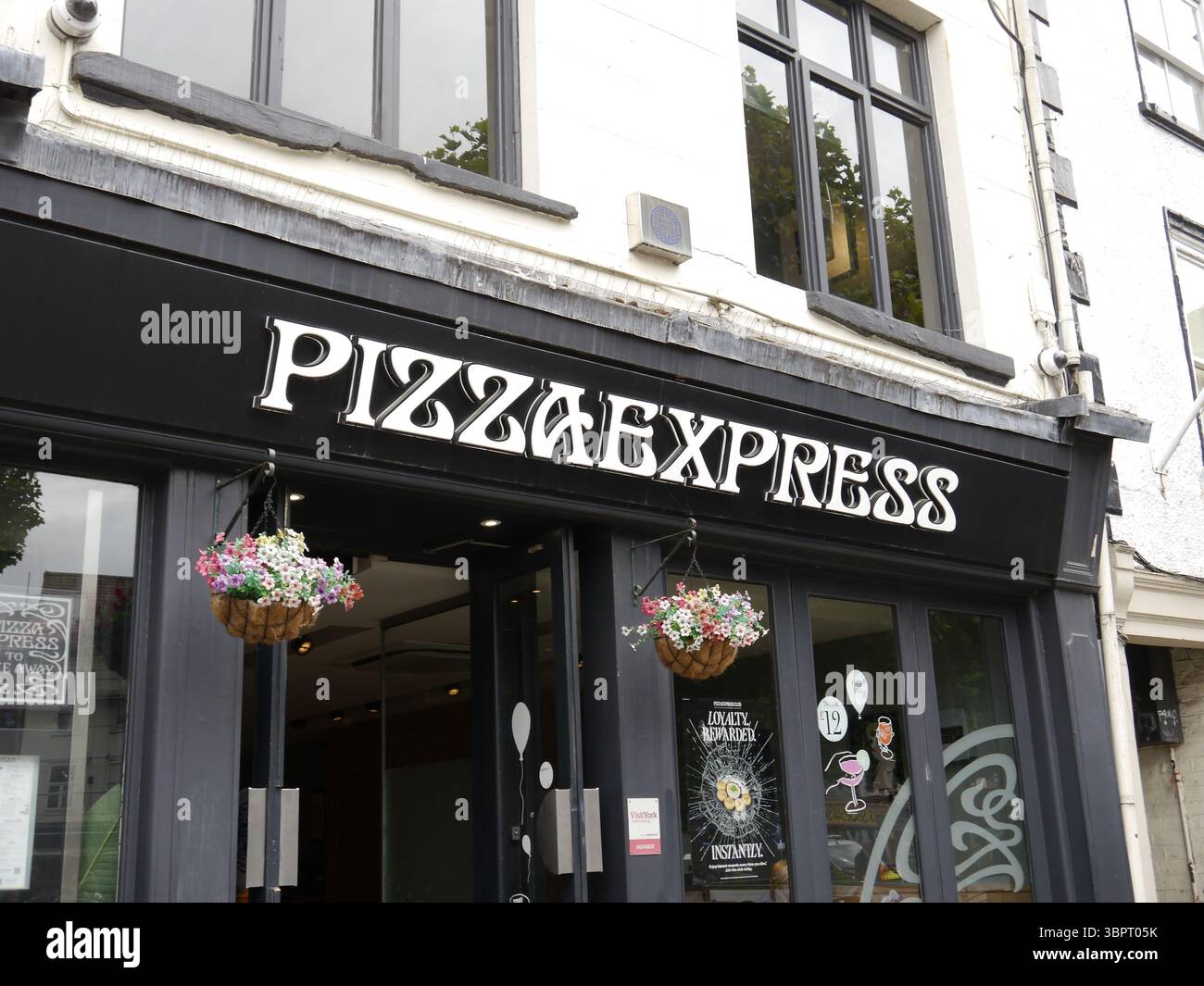 pizza express Corporate logo signs in York City centre in June 2025 ...