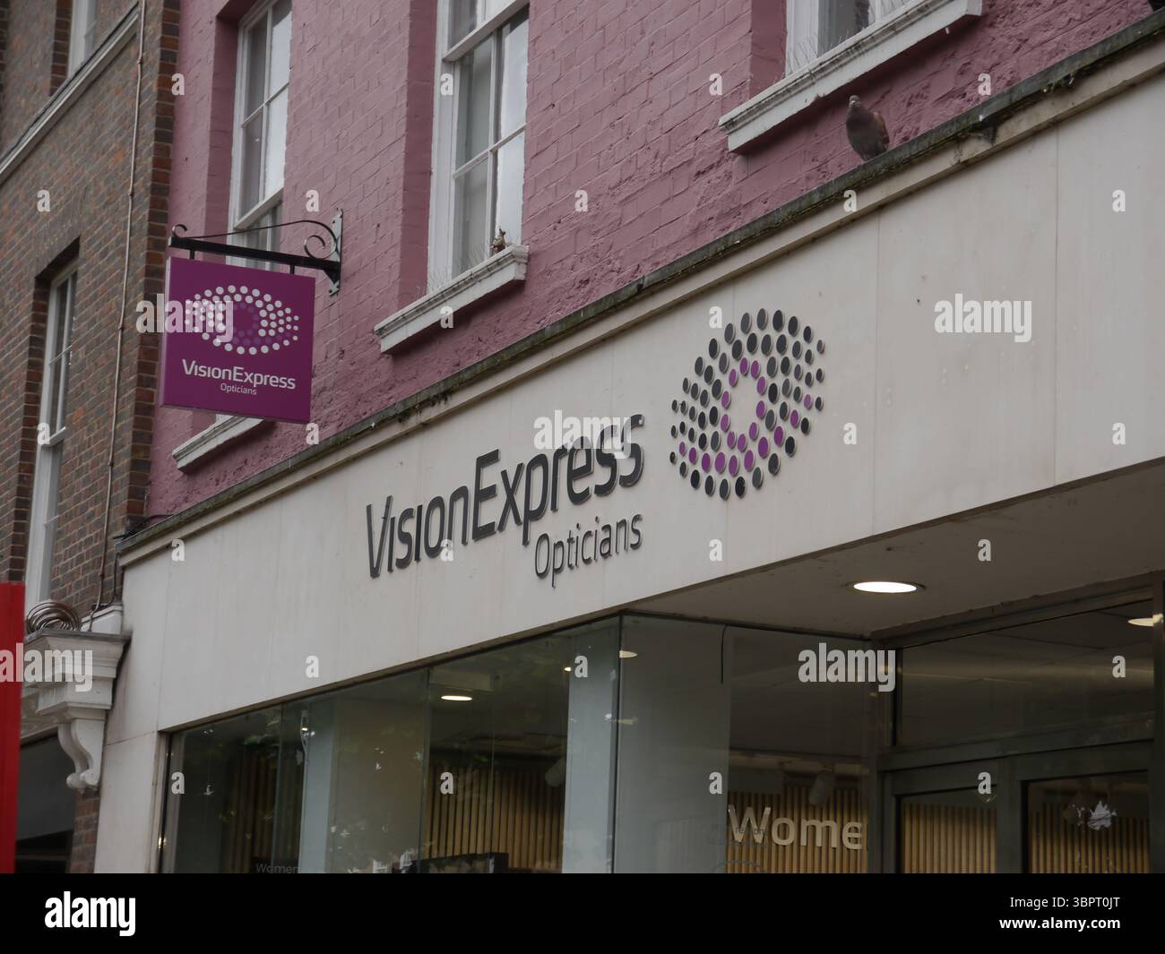 Vision Express opticians Corporate logo signs in York City centre in ...