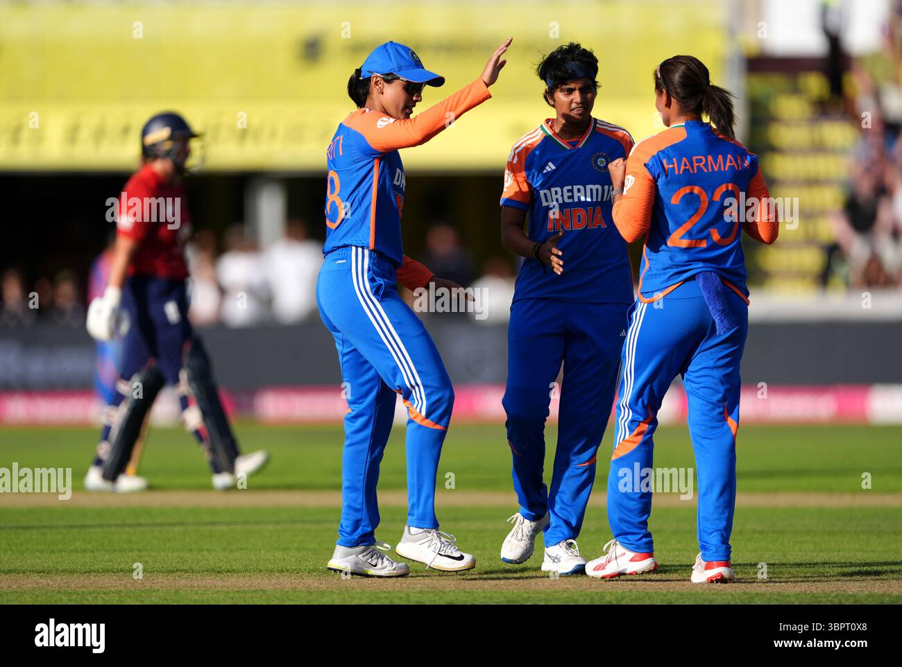 India's Arundhati Reddy celebrates the wicket of England's Alice Capsey ...