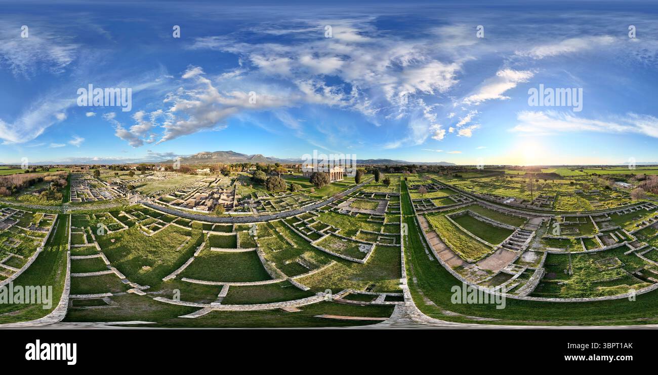 Panoramic view of ancient ruins under a blue sky with scattered clouds ...